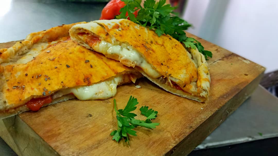 Taquero Mucho - Pork ropa vieja pizza calzone (30 cm) - Delivery Service